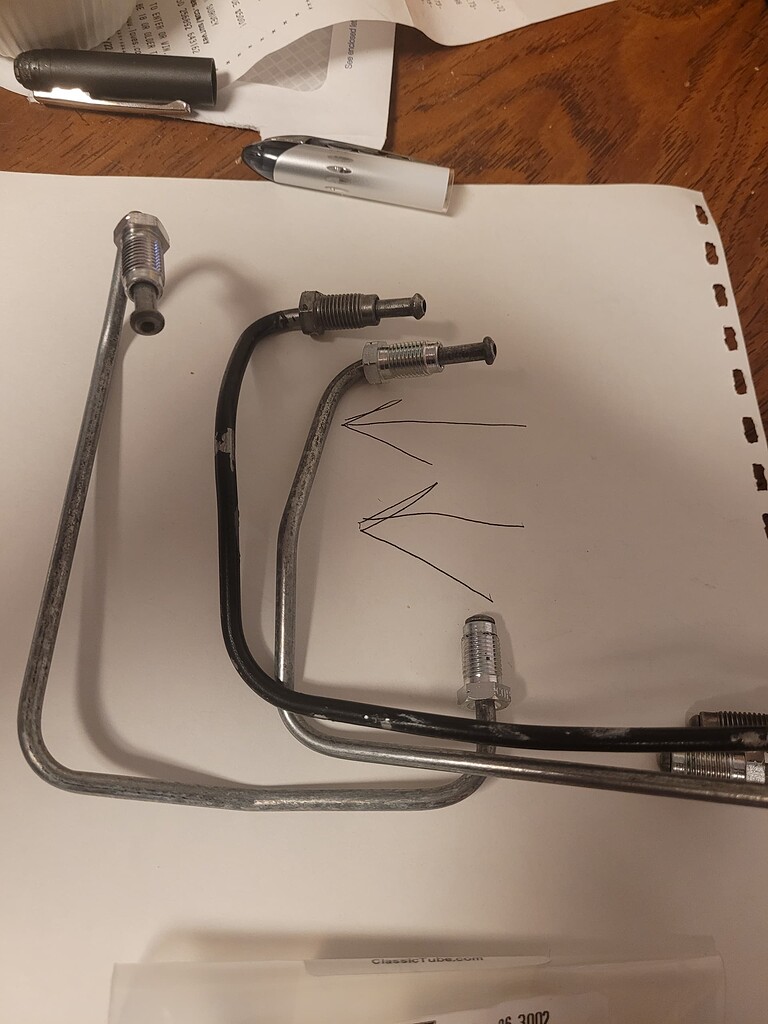 Looking for a right rear brake crossover pipe and reservac bracket ...