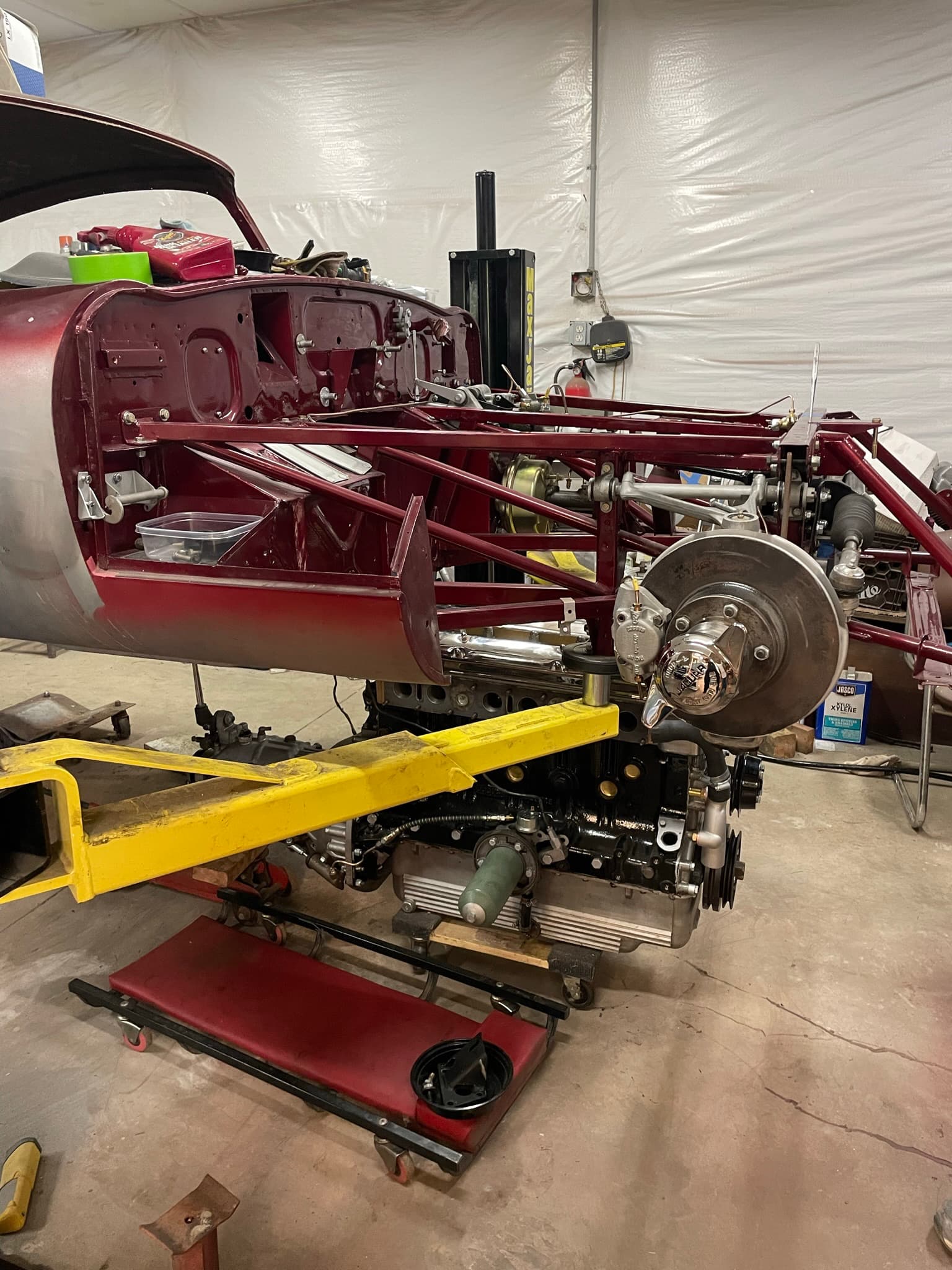 Sequential photos of engine install from underneath - E-Type - Jag ...