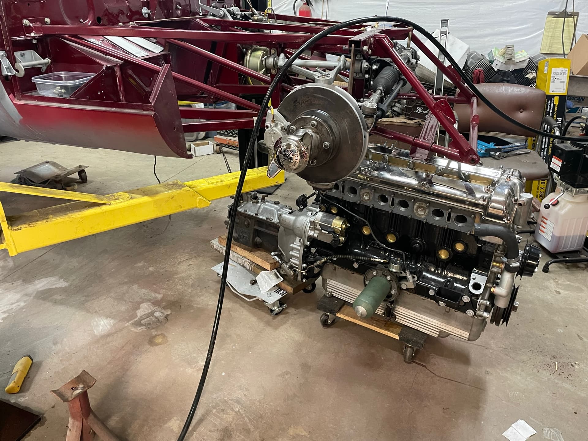 Sequential photos of engine install from underneath - E-Type - Jag ...