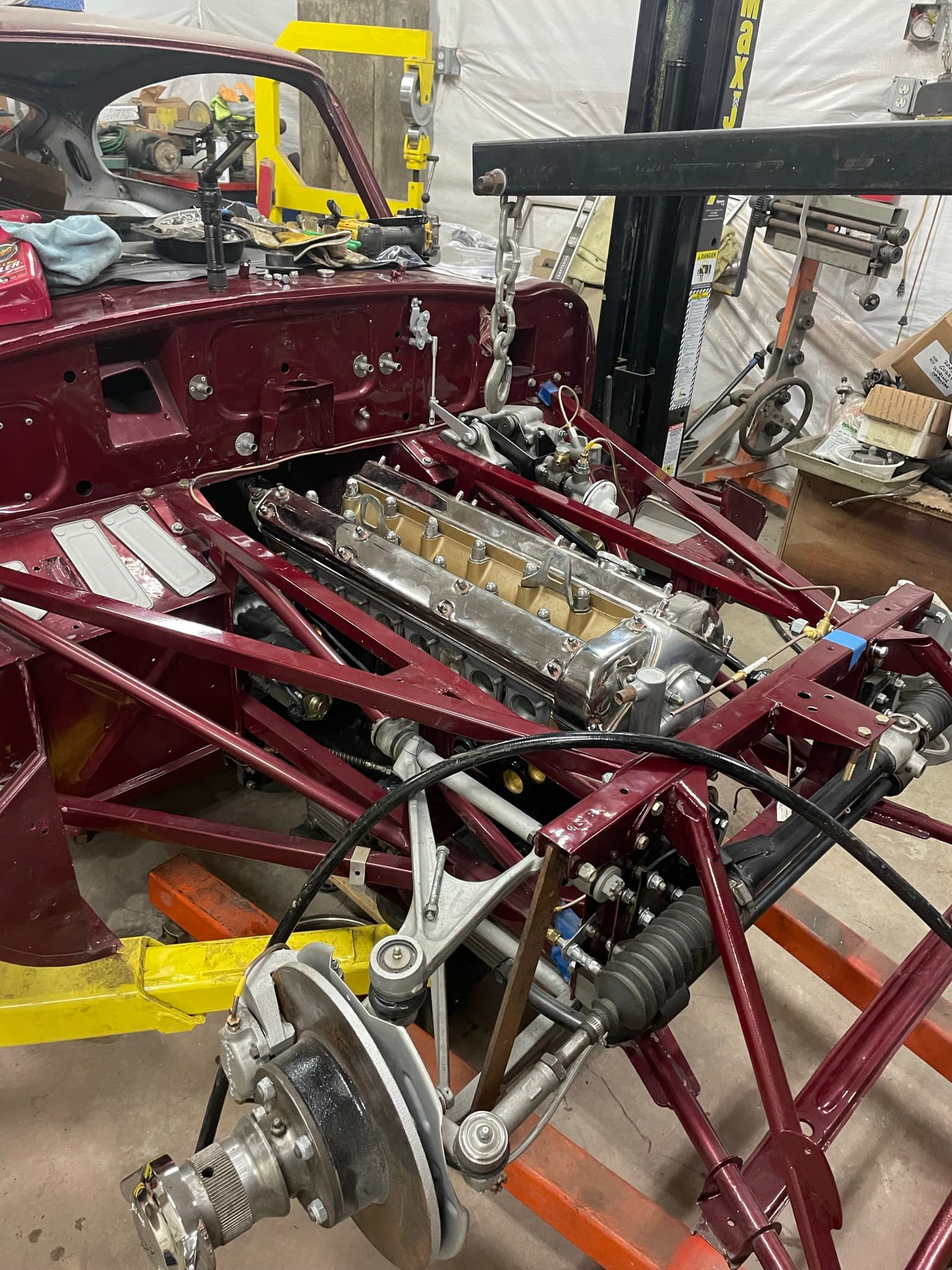 Sequential photos of engine install from underneath - E-Type - Jag ...