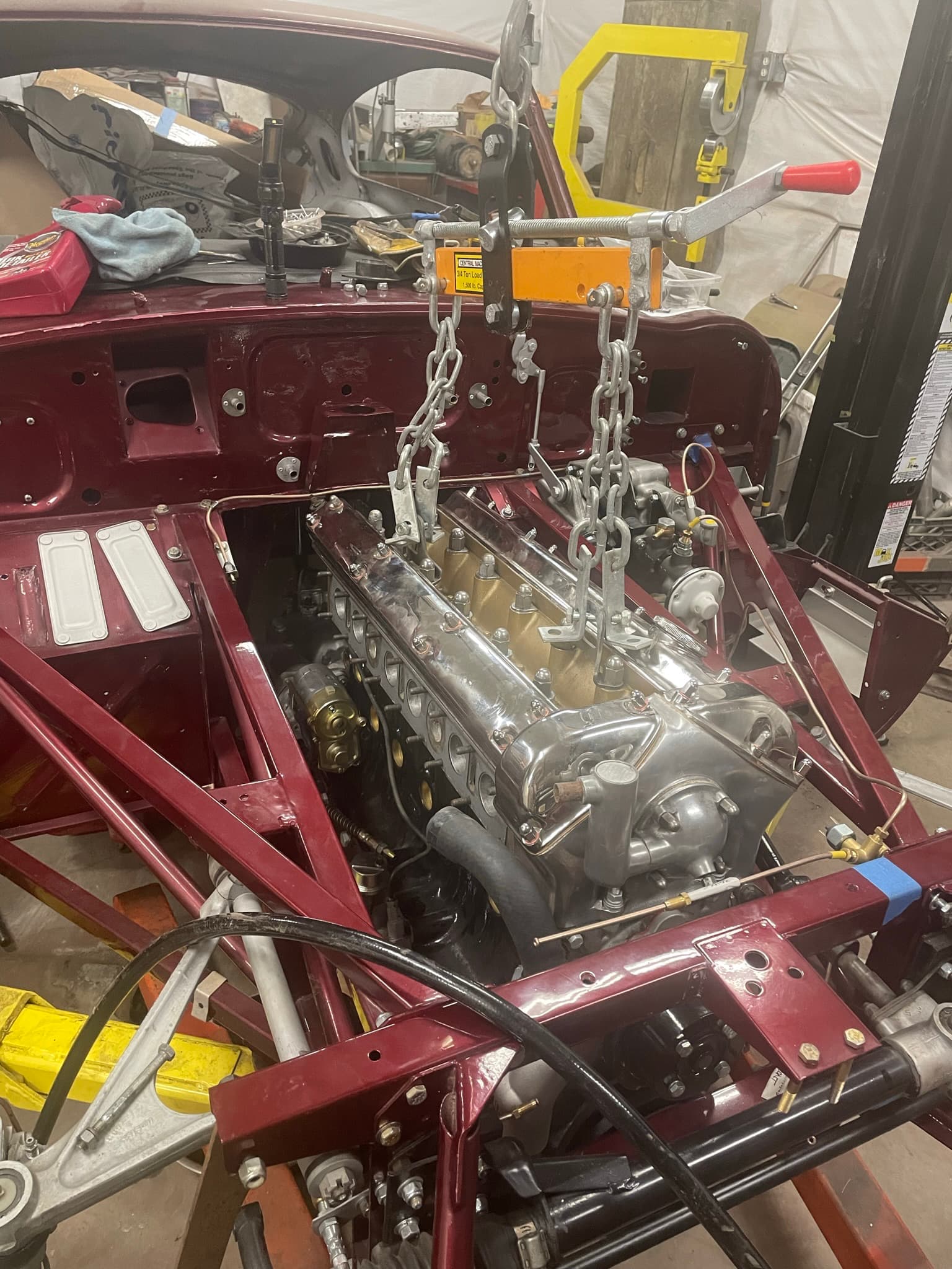 Sequential photos of engine install from underneath - E-Type - Jag ...