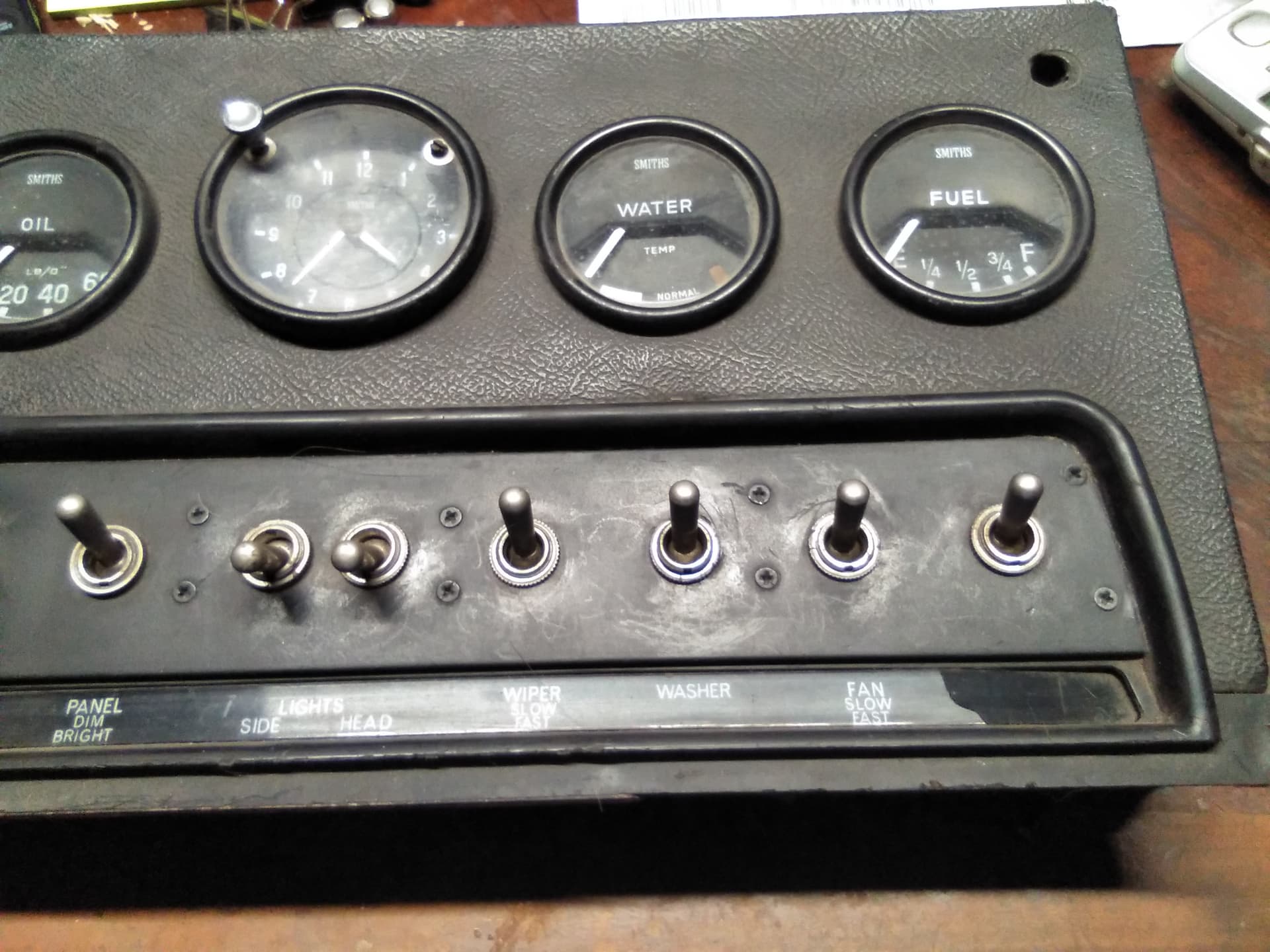 Is this set of switches below center gauges original or a modification ...