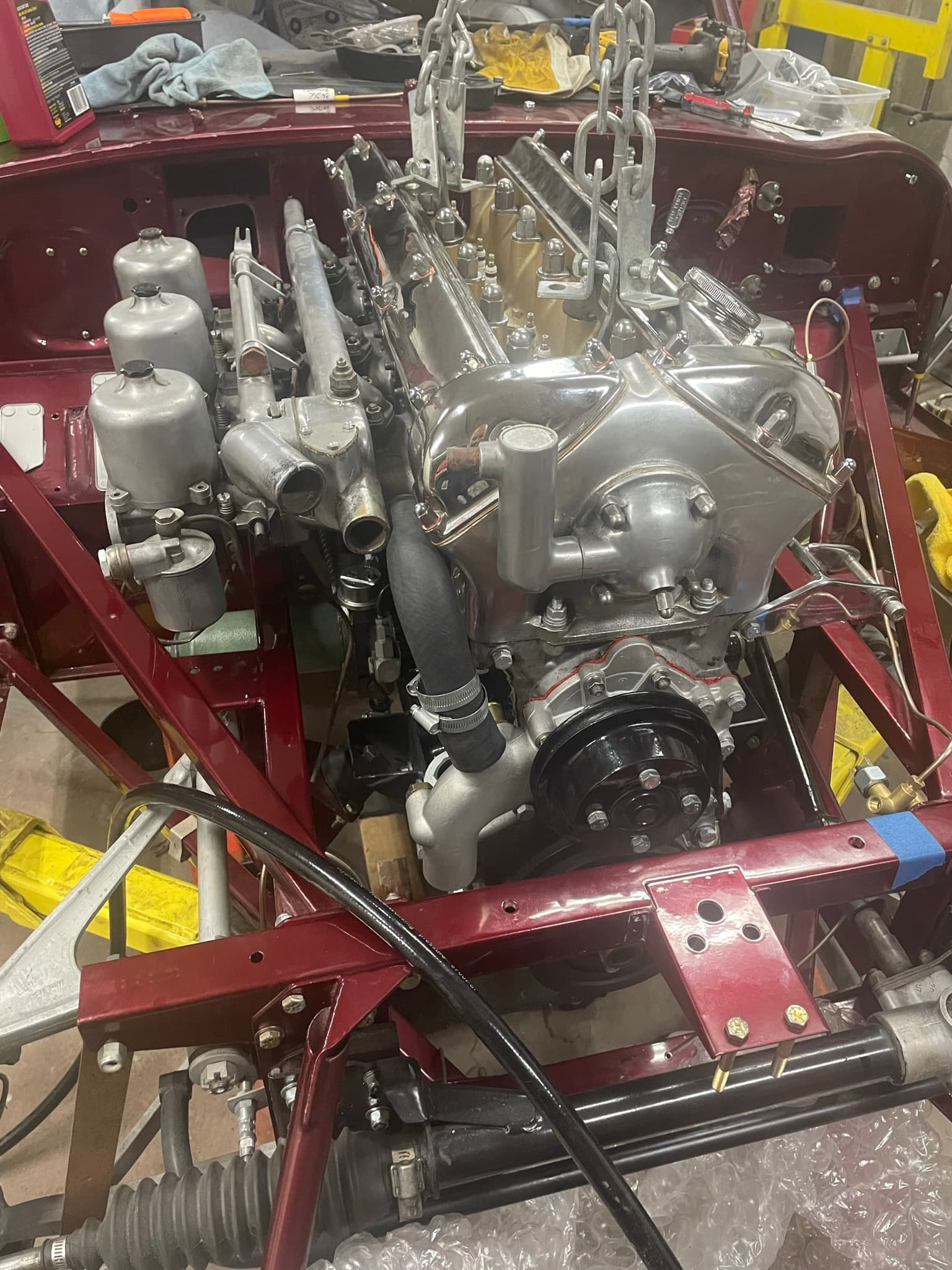 Sequential photos of engine install from underneath - E-Type - Jag ...